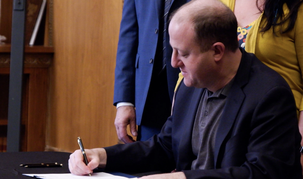 Governor signs bill abolishing Colorado’s death penalty, commutes ...